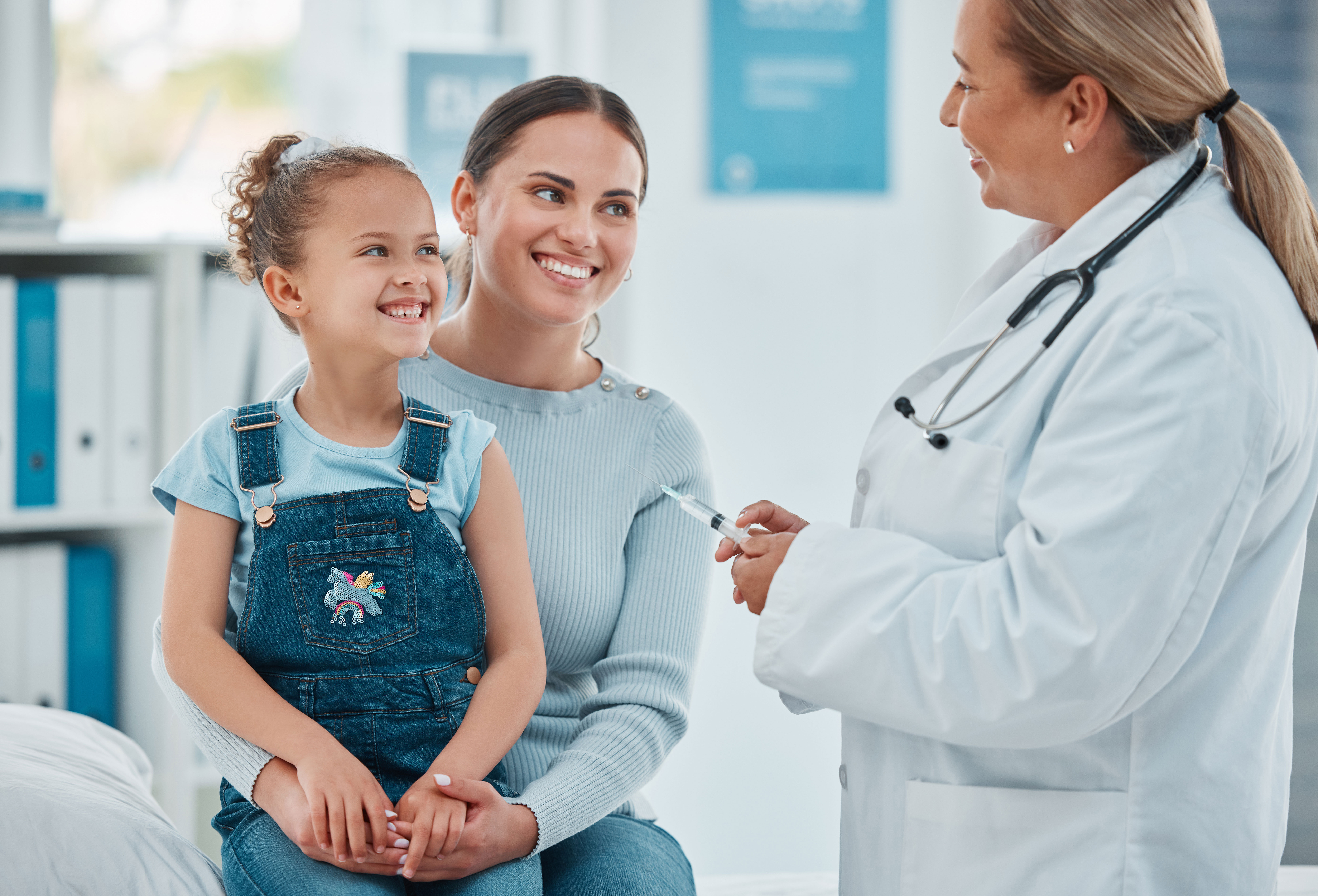 Healthcare professional prepares to administer flu shot vaccination