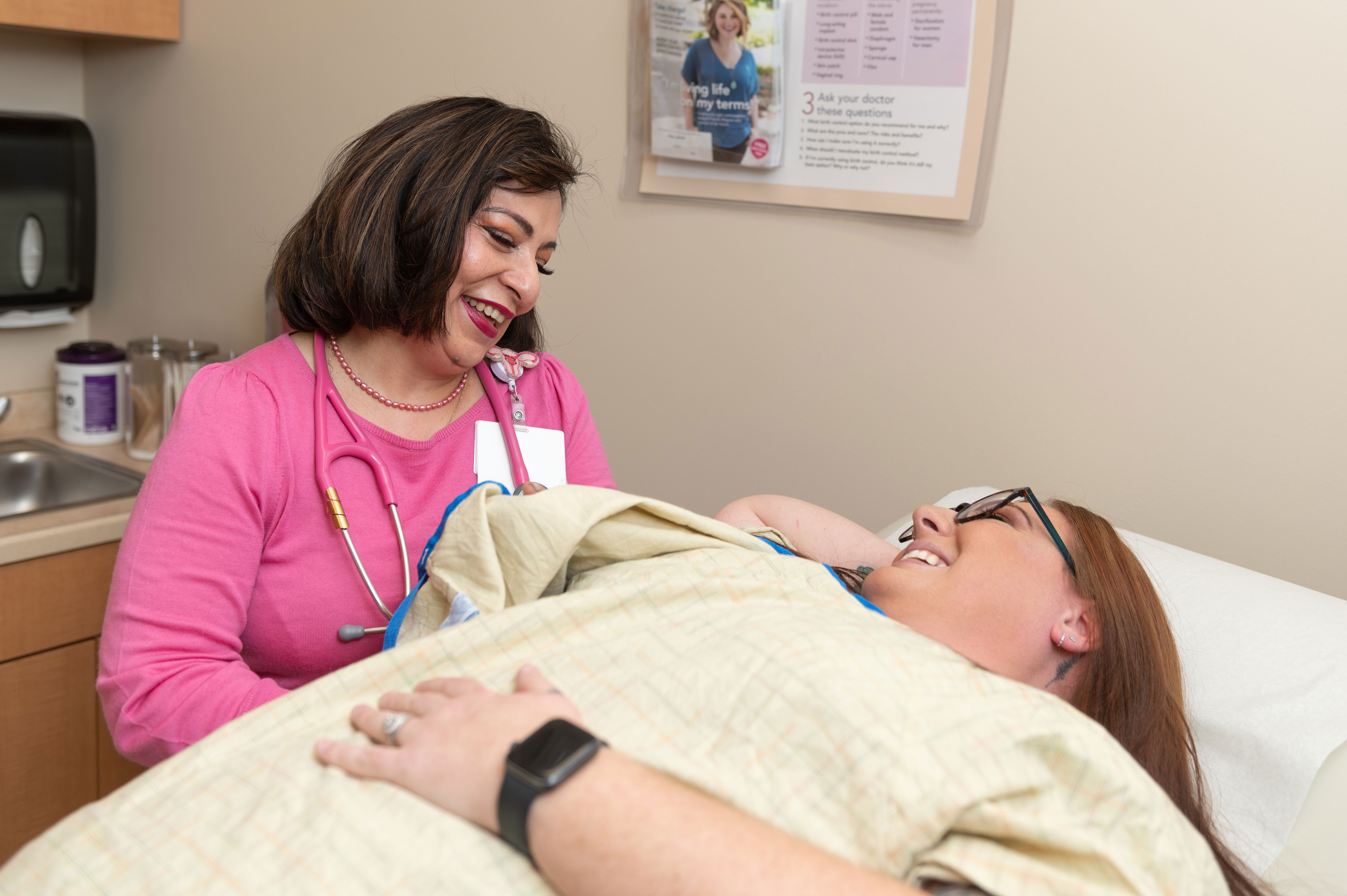 Dr. Abha Gupta speaks to a patient a screening appointment