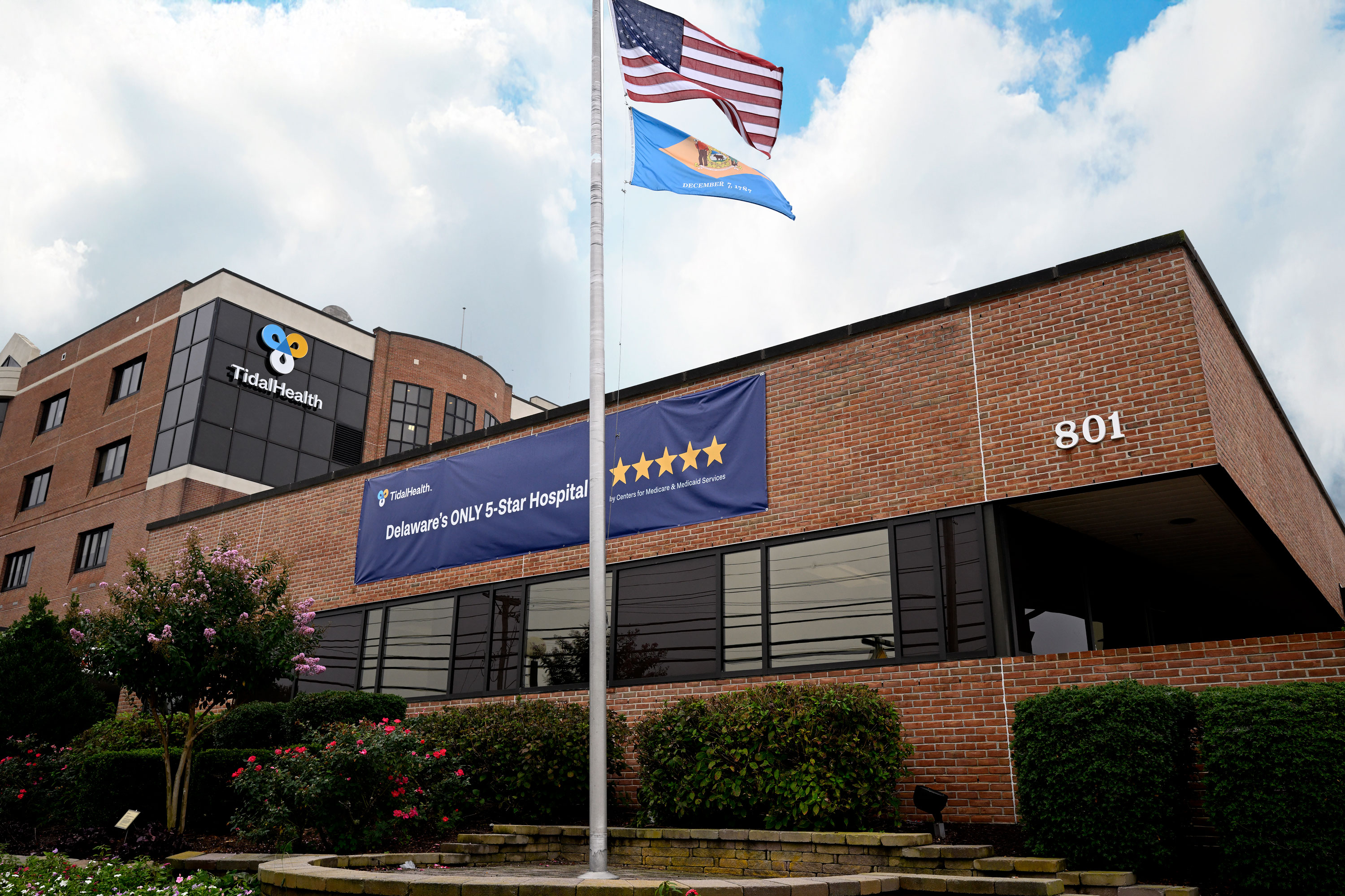 The outside of TidalHealth Nanticoke, showing a five-star banner